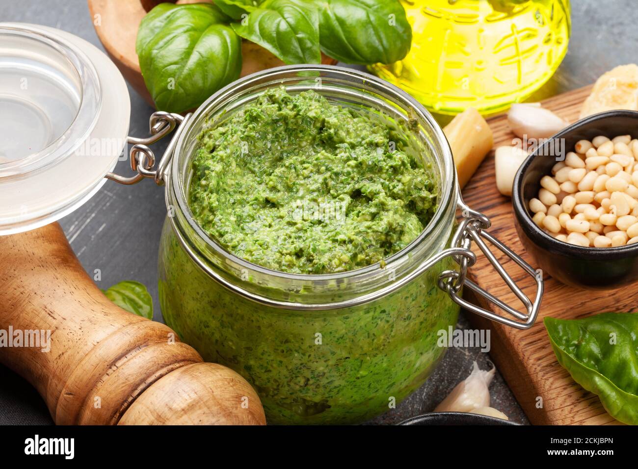 Homemade pesto sauce with basil leaves, pine nuts, parmesan and garlic ...