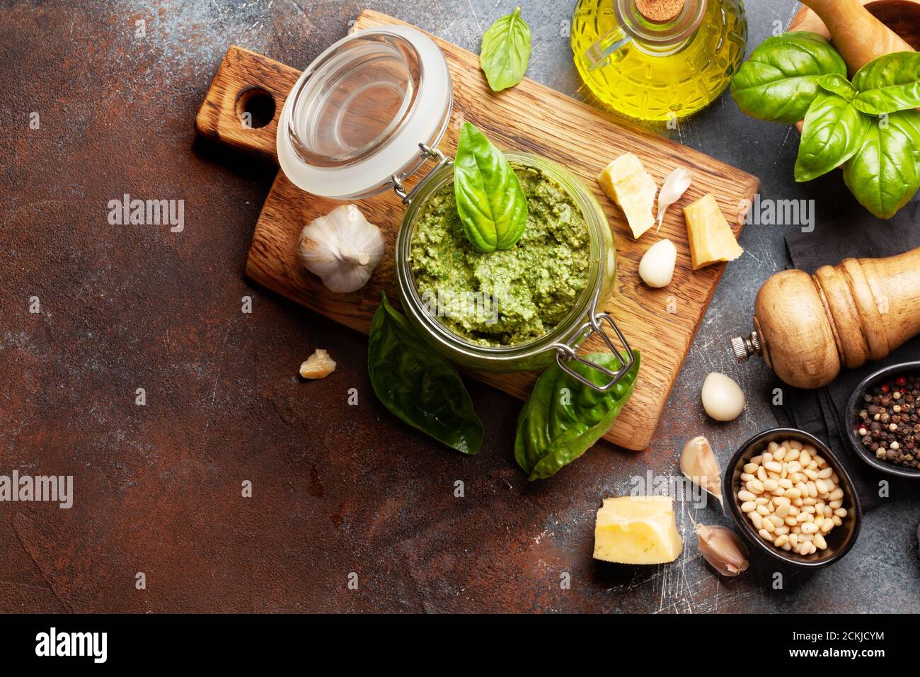 Homemade pesto sauce with basil leaves, pine nuts, parmesan and garlic ...