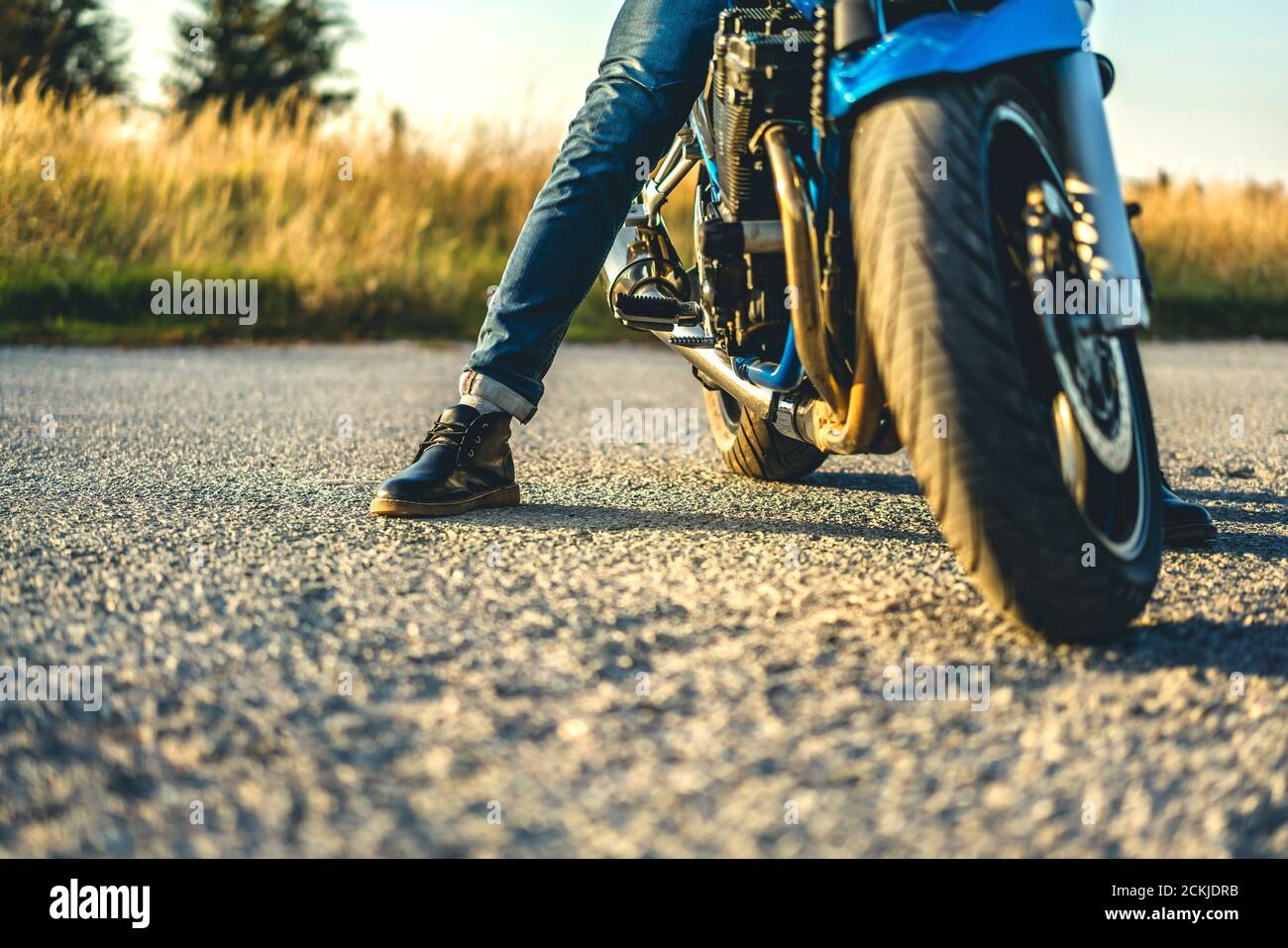 Biker on sport motorcycle outdoor on the road Stock Photo - Alamy
