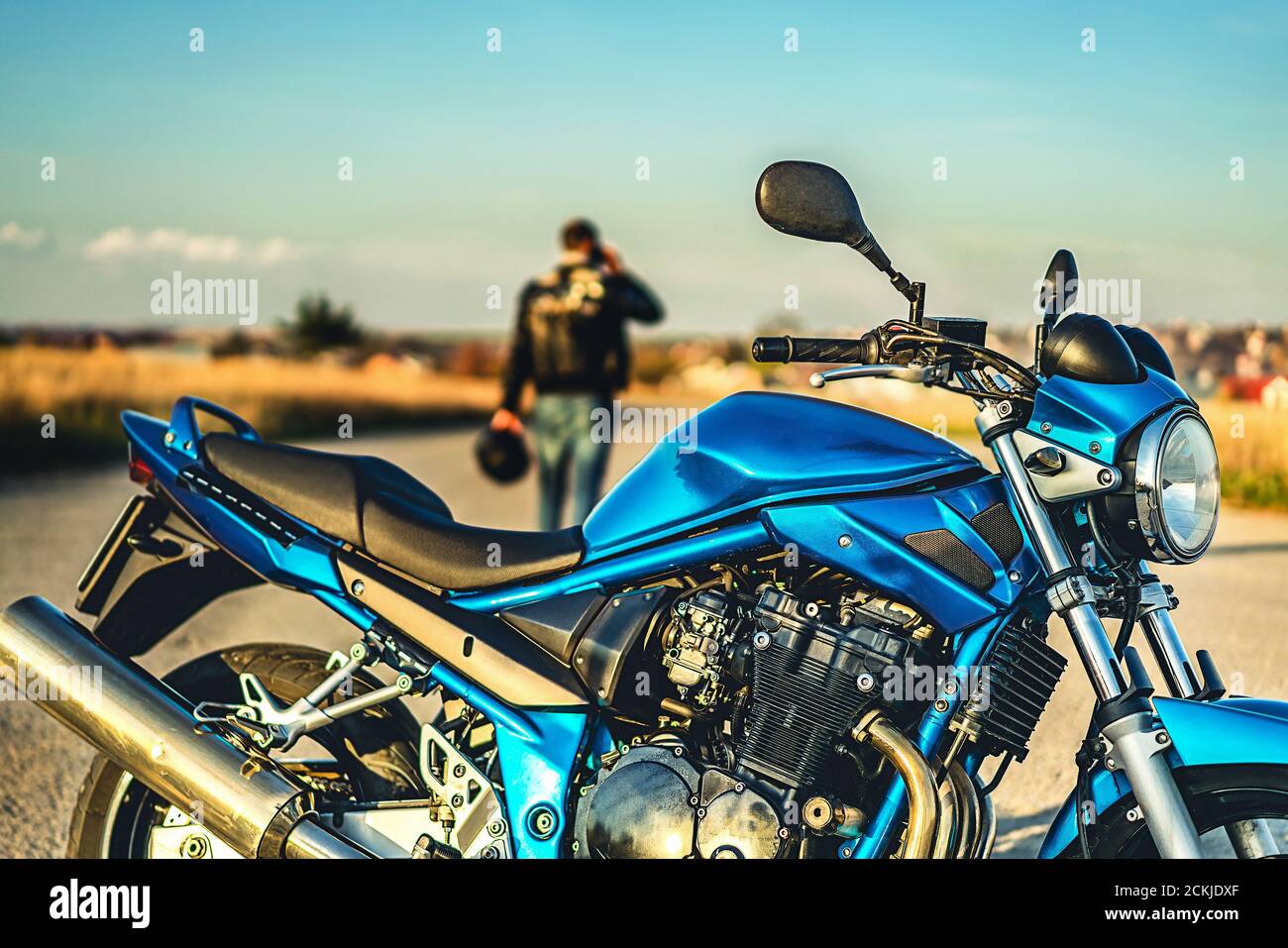 Biker on sport motorcycle outdoor on the road Stock Photo - Alamy