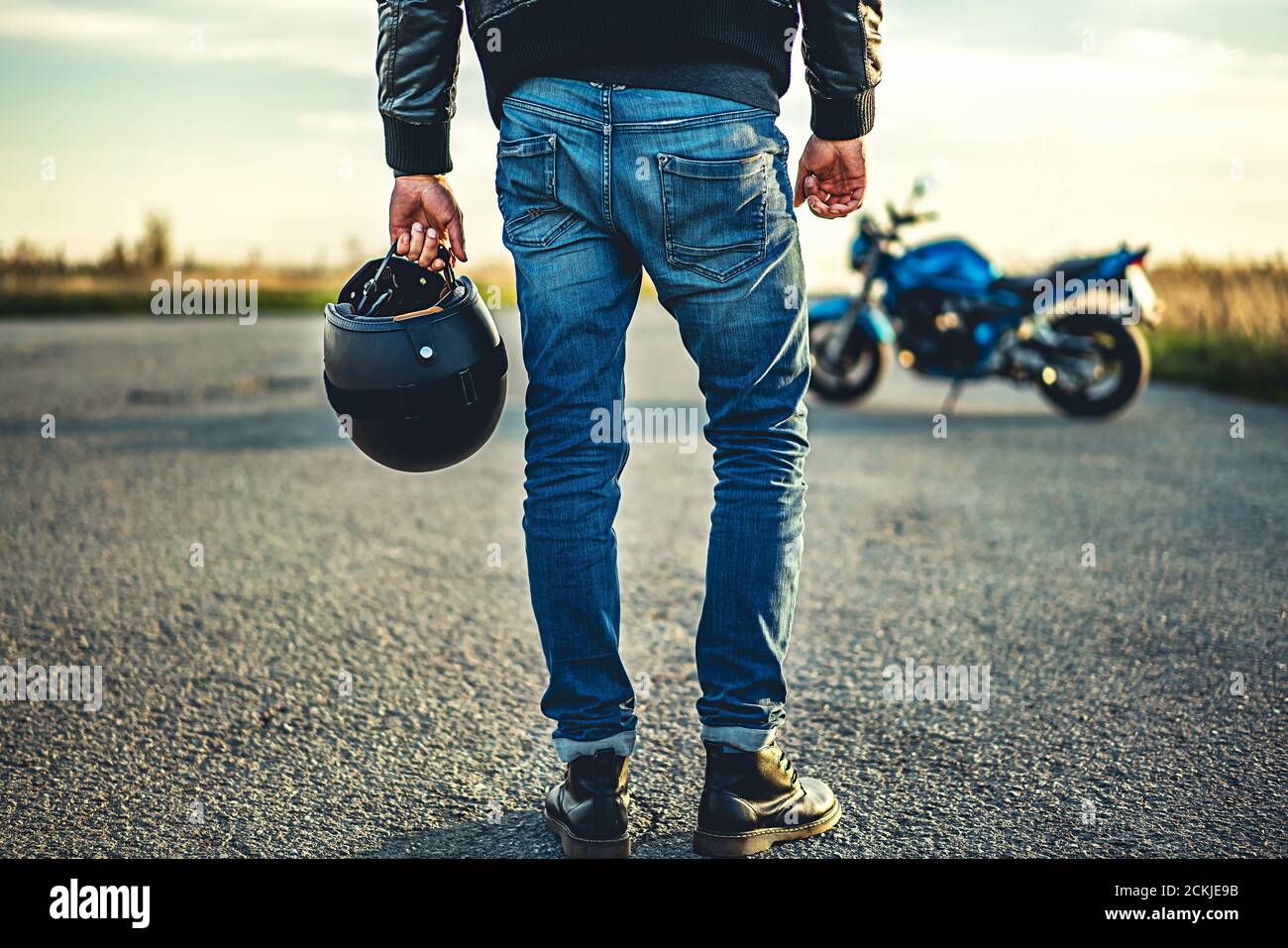 Biker on sport motorcycle outdoor on the road Stock Photo - Alamy
