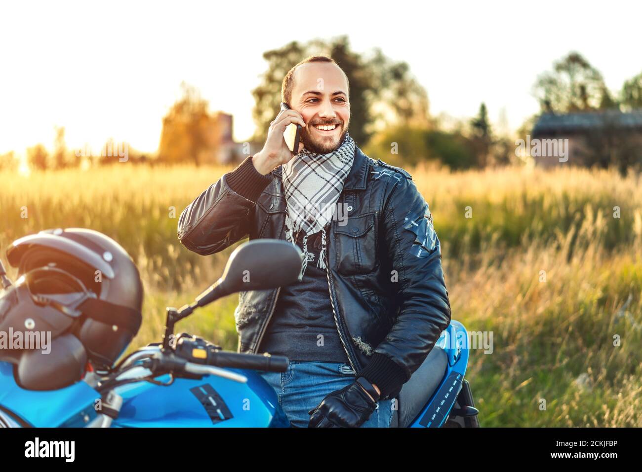 Biker on sport motorcycle outdoor on the road Stock Photo - Alamy