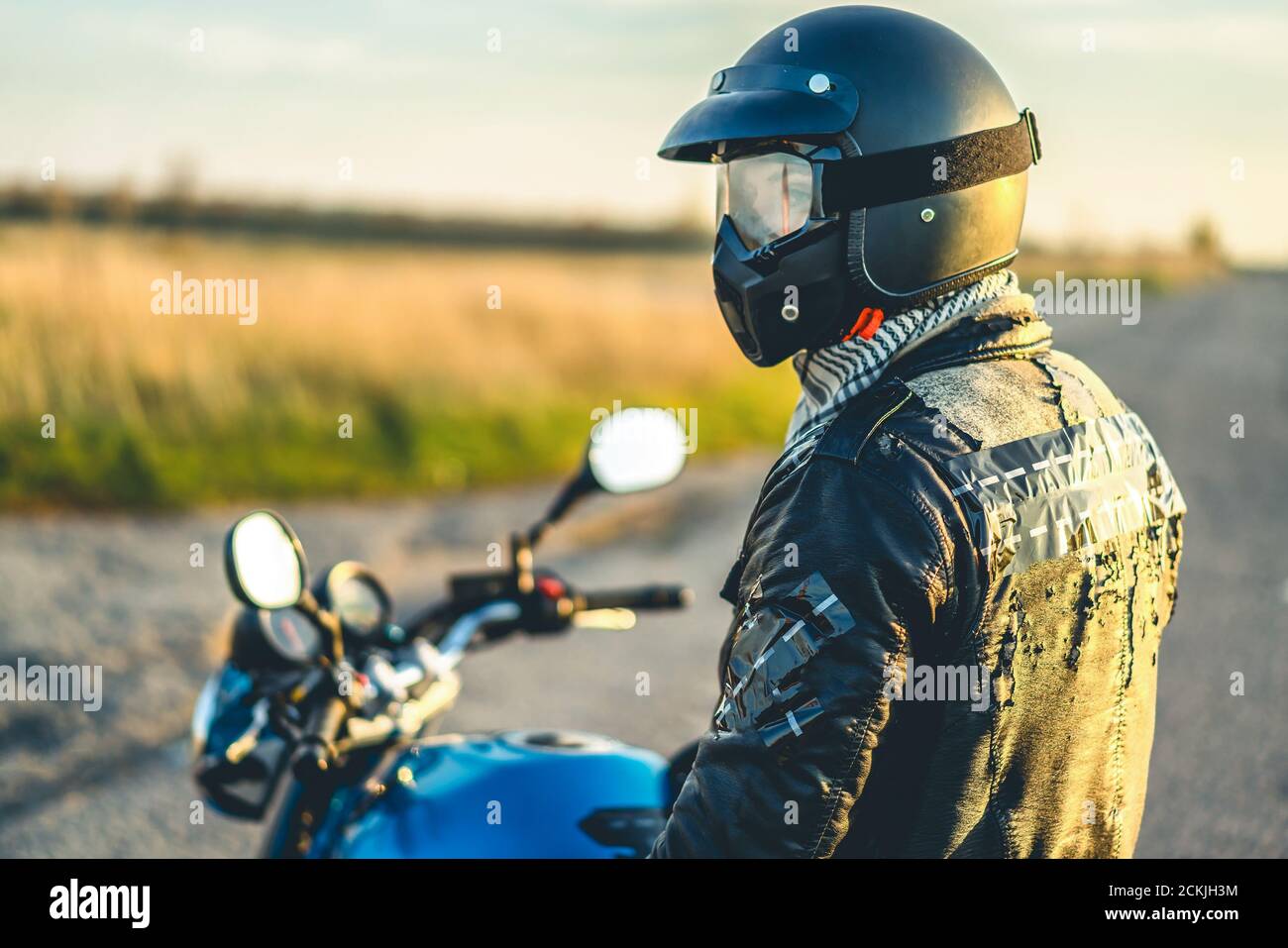 Biker on sport motorcycle outdoor on the road Stock Photo - Alamy