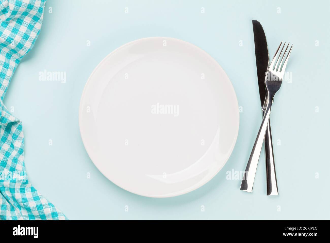 Empty plate, fork and knife. Top view flat lay with copy space Stock Photo - Alamy