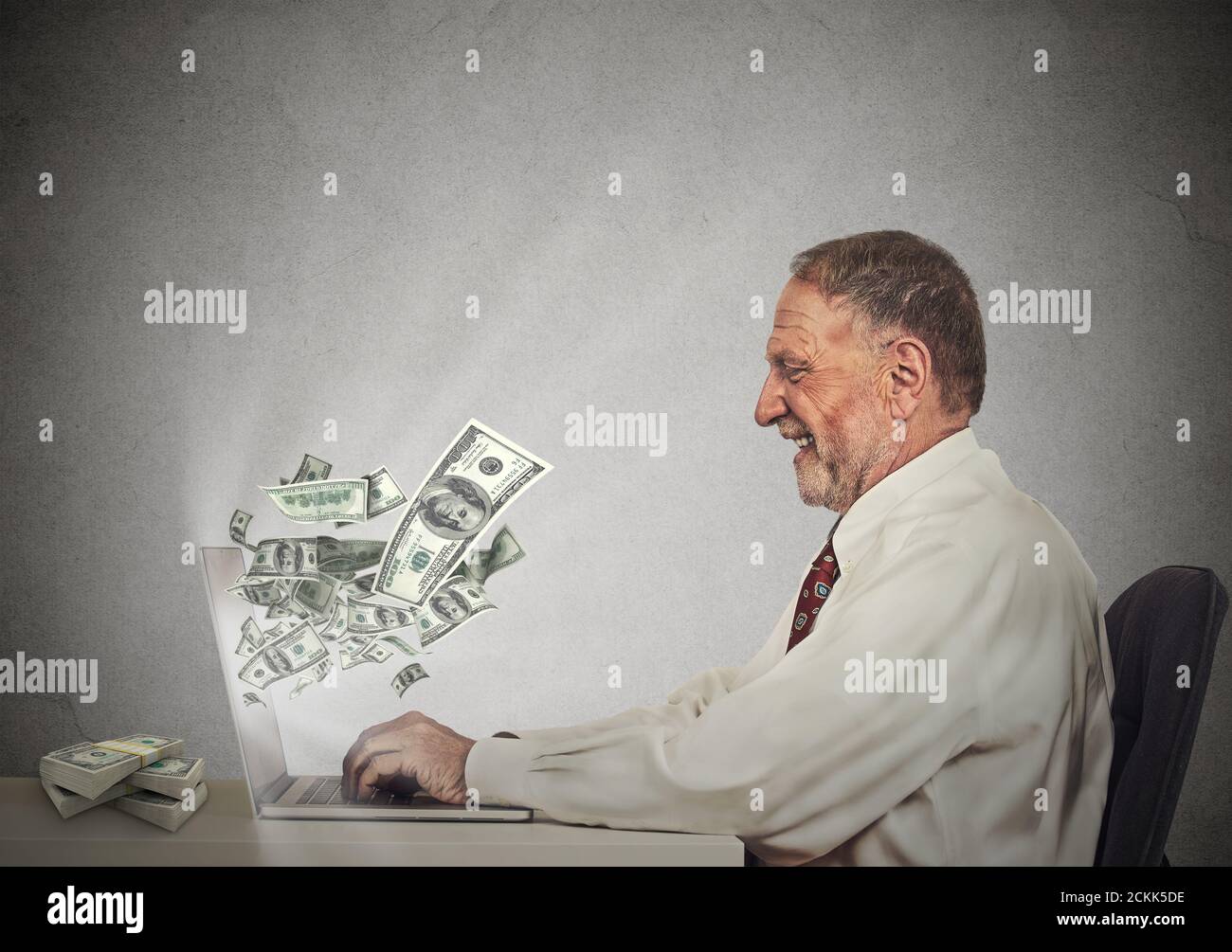 Side profile happy smiling business man working online on computer ...