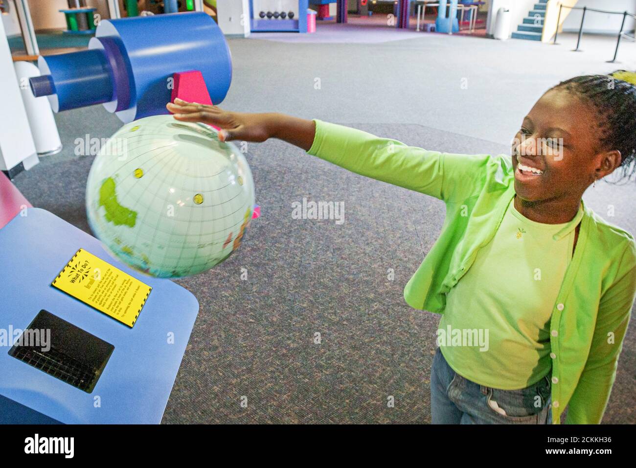 Exhibit display displays science hands on black girl hi-res stock ...