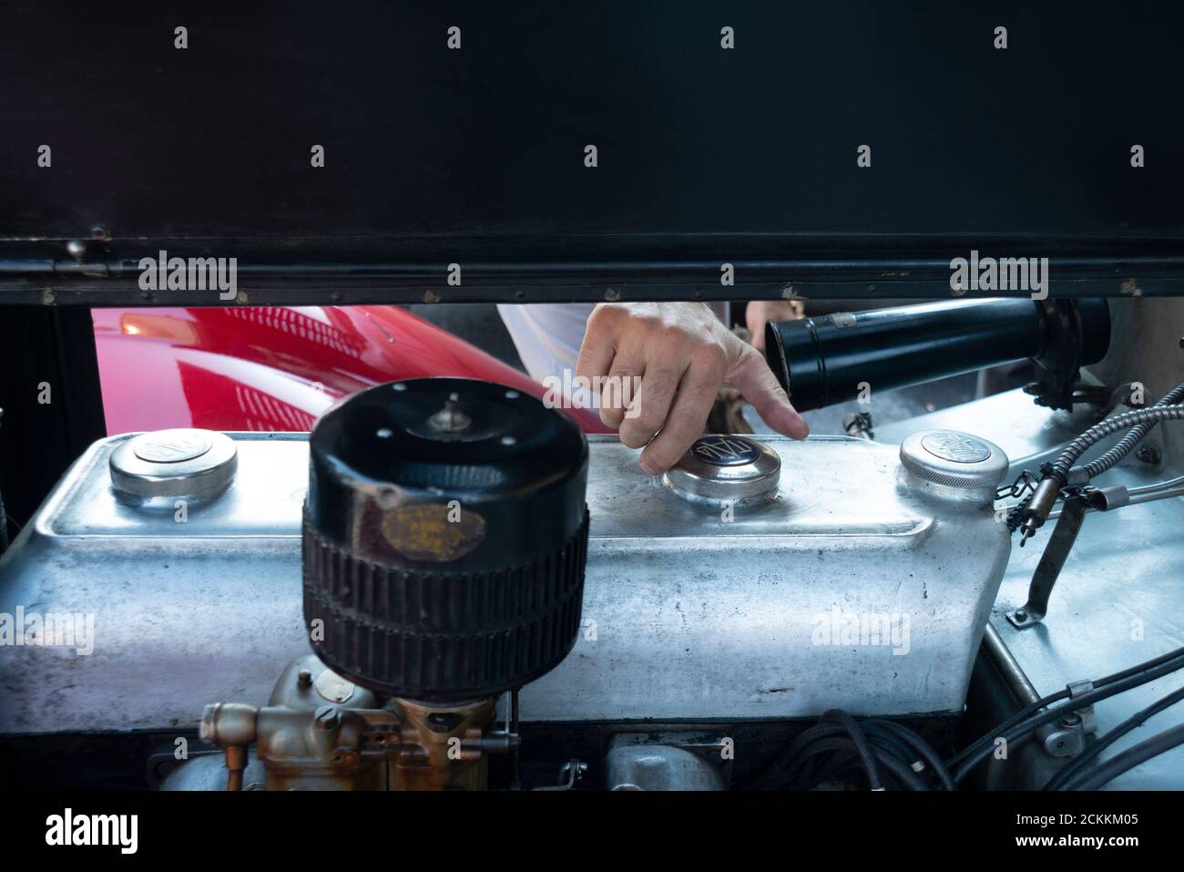 Mechanic Works on Repairing a Old Cars Stock Photo - Alamy