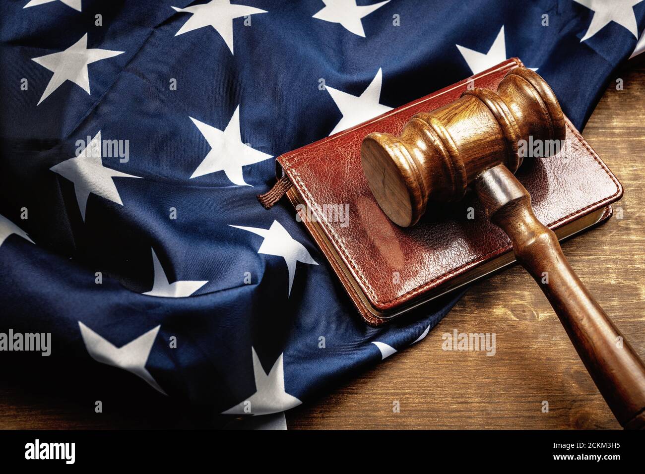 Image of wooden judge hammer on notepad Stock Photo - Alamy