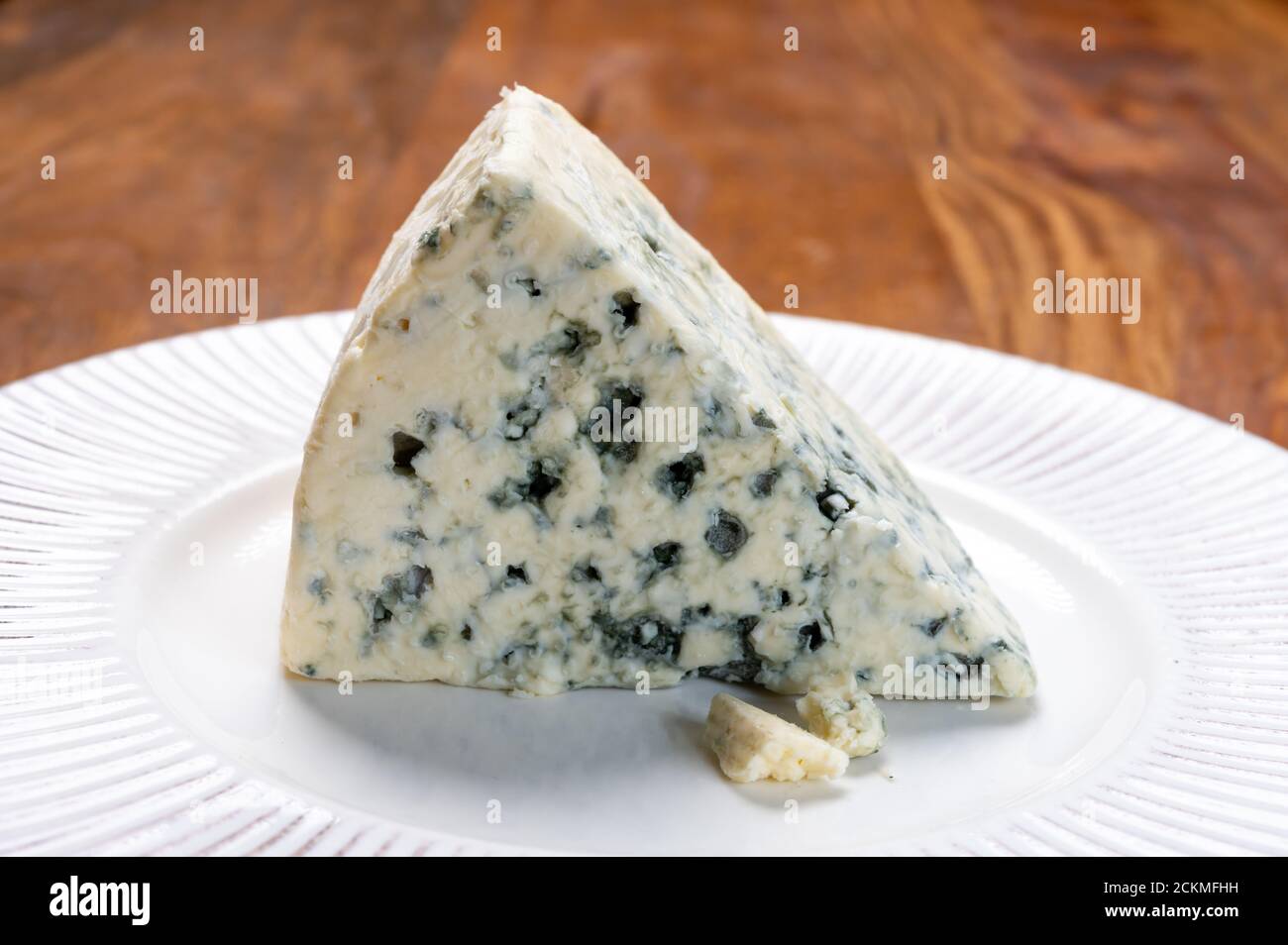 Cheese collection, piece of danish blue cheese with blue mold close up ...