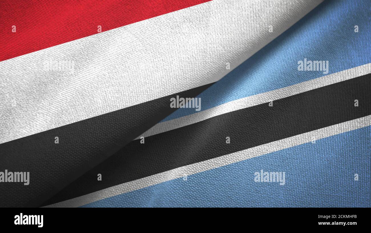 Yemen and Botswana two flags textile cloth, fabric texture Stock Photo ...