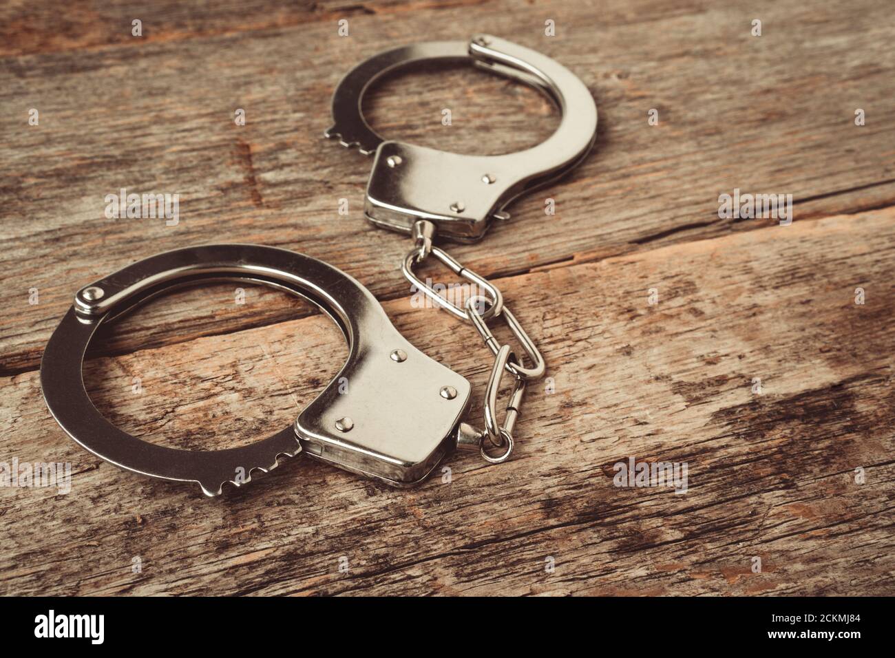 Handcuffs criminal vintage hi-res stock photography and images - Alamy
