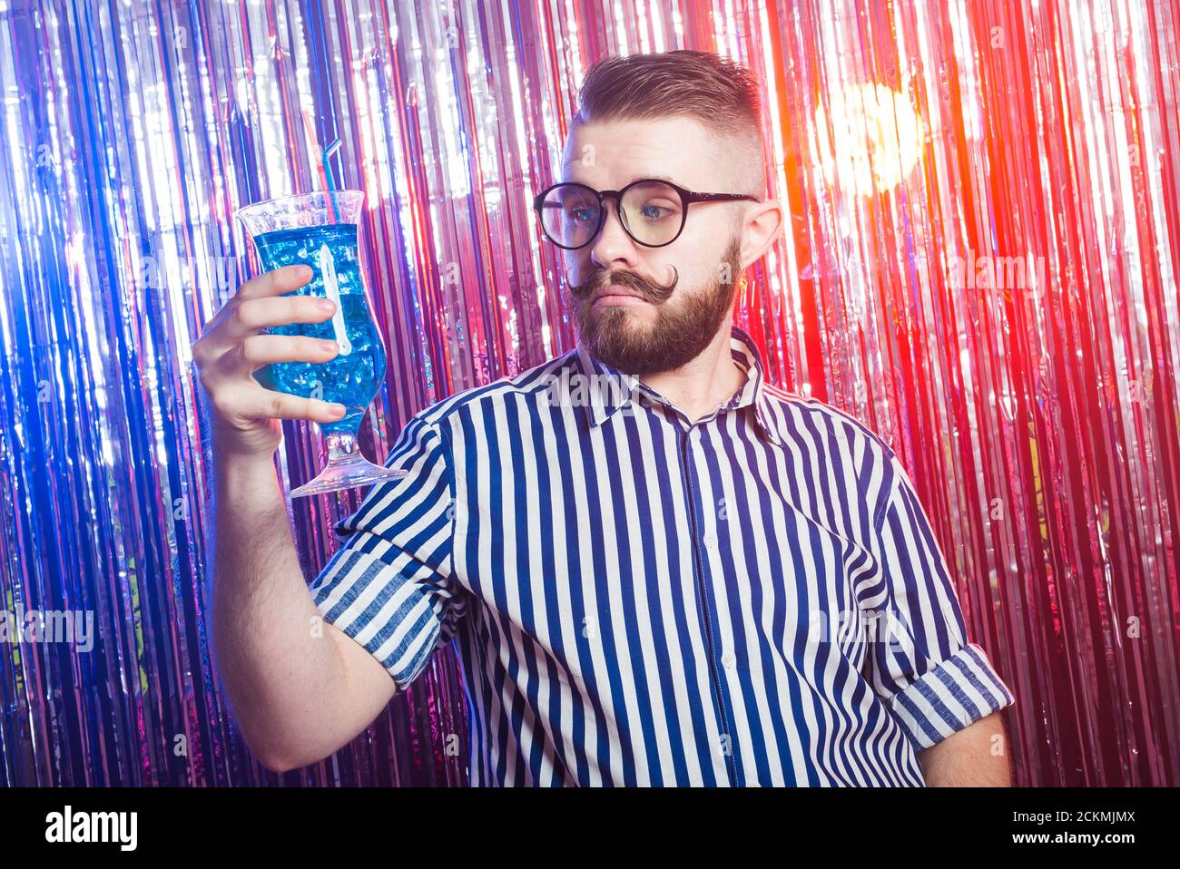Alcoholism, fun and fool concept - Drunk guy at party in a nightclub ...