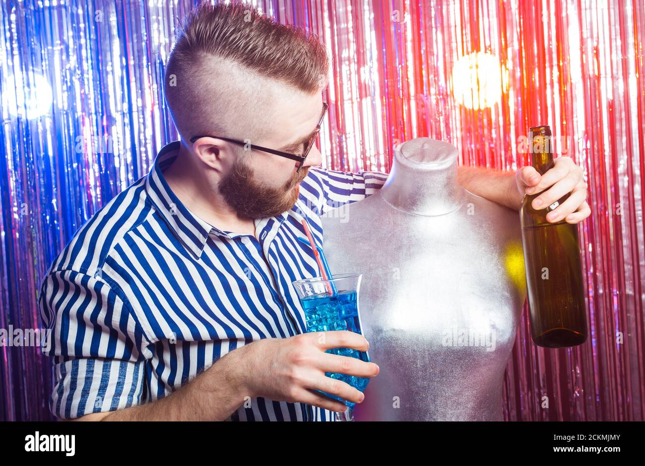 Alcoholism, fun and fool concept - Drunk guy at party in a nightclub ...