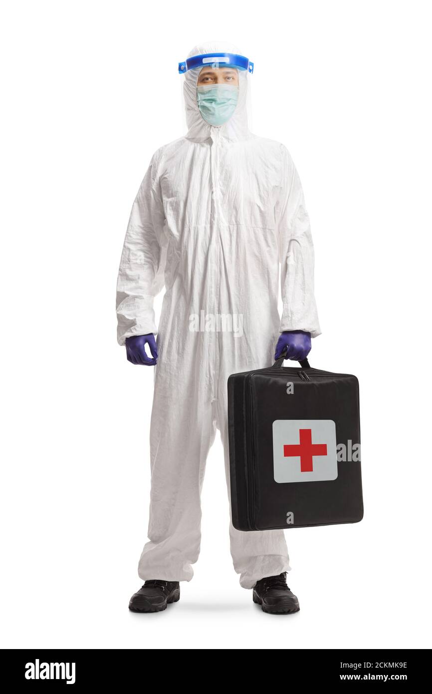Full length portrait of a medical worker in a hazmat suit carrying a ...