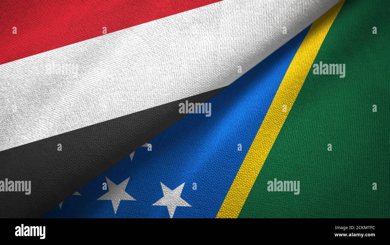 Yemen and Solomon Islands two flags textile cloth, fabric texture Stock ...