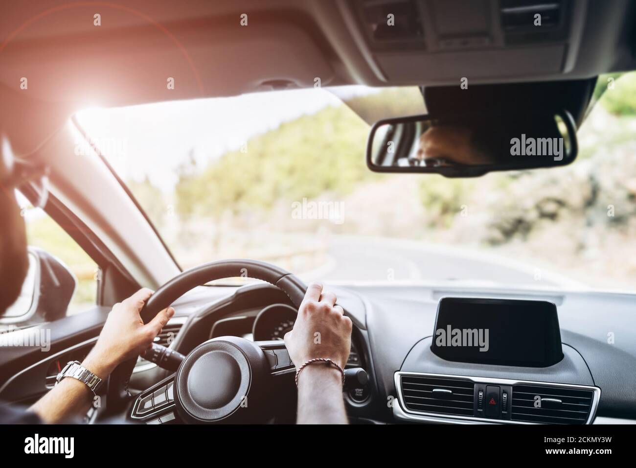 Man driving car with view from inside Stock Photo - Alamy