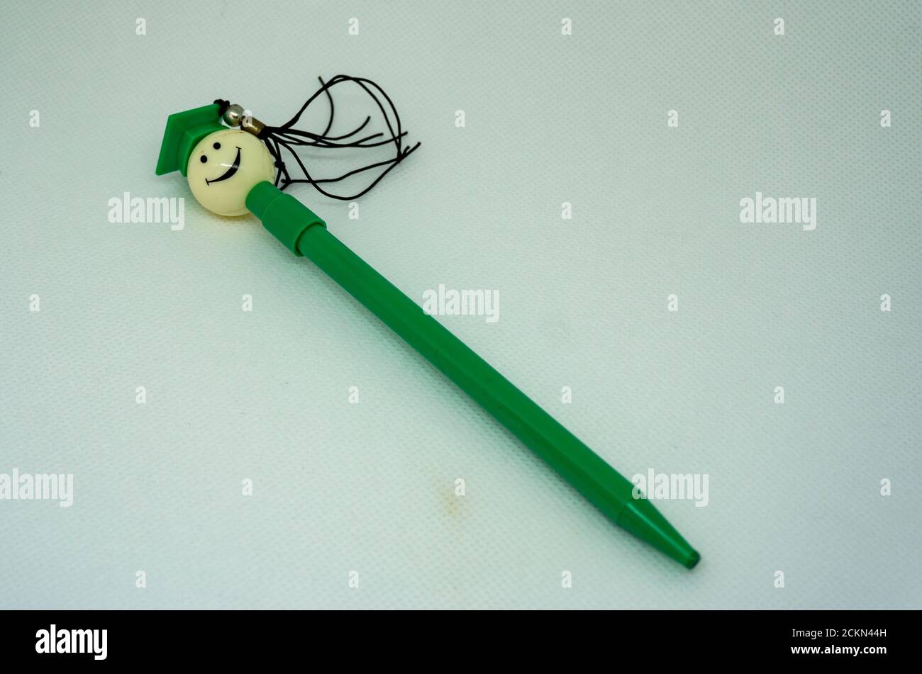 green pen for graduation gift Stock Photo - Alamy