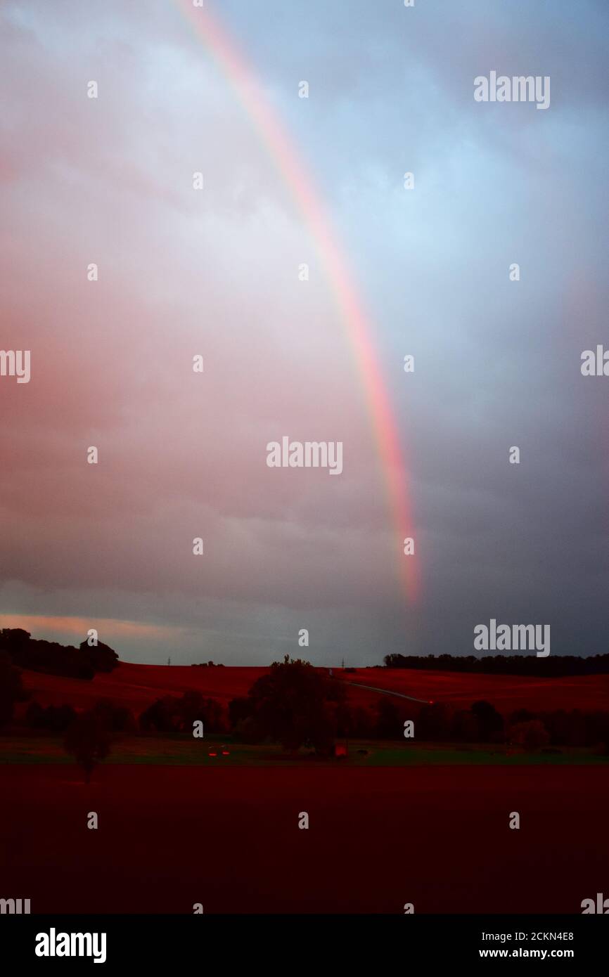 Bright blue background rainbow hi-res stock photography and images - Alamy