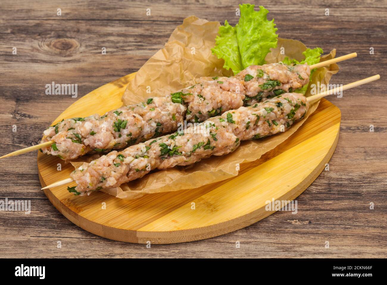 Raw pork skewer kebab ready for grill Stock Photo - Alamy