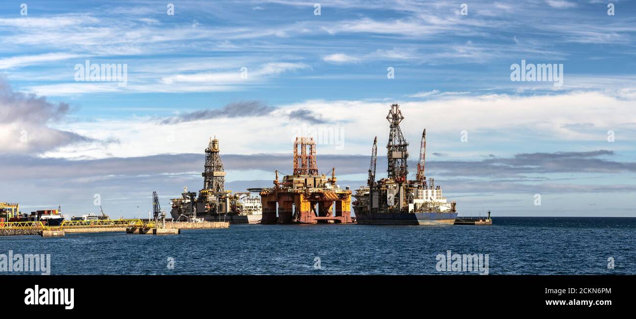 Panorama of the oil drilling platform in the ocean with transportation ...