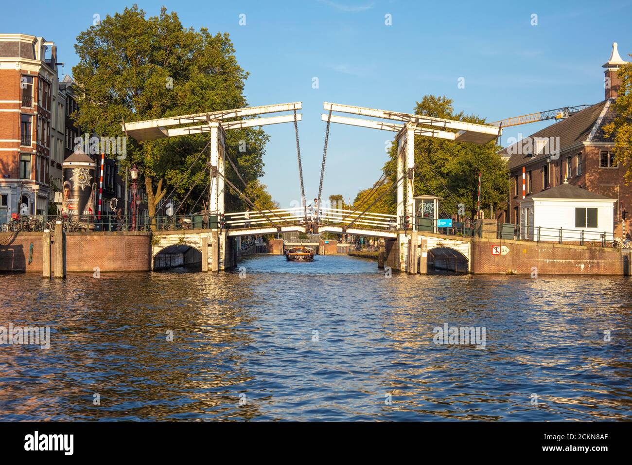 Detail of bridge canal in Amsterdam at sunset Stock Photo - Alamy