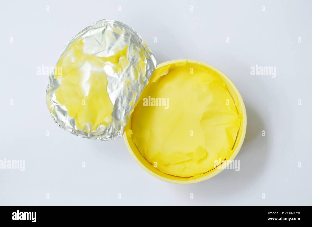 margarine in box packaging on white background Stock Photo - Alamy