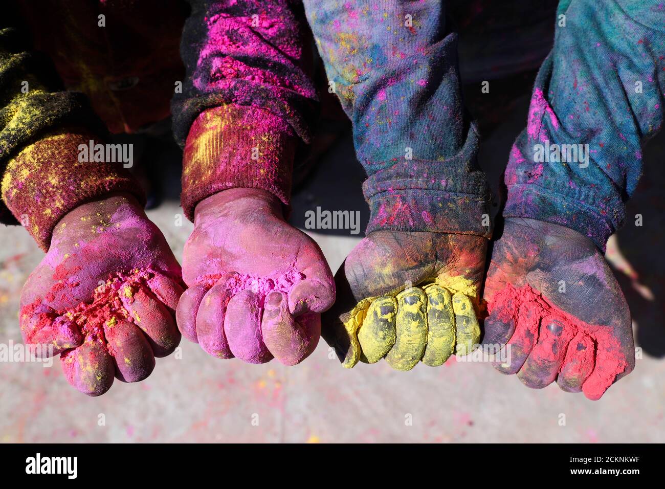 Kids Hand full with colors a colorful Hands Stock Photo - Alamy