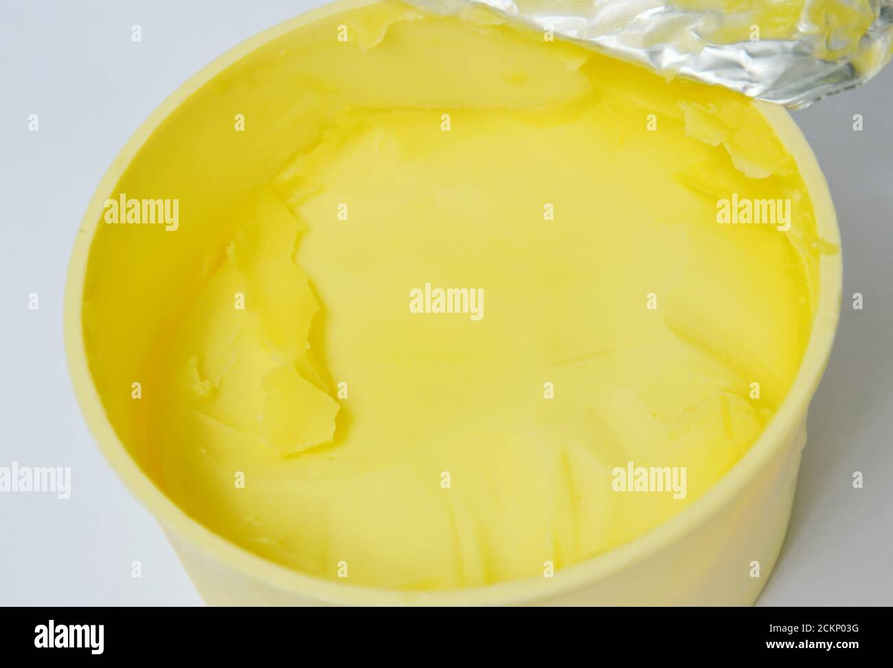 margarine in box packaging on white background Stock Photo - Alamy