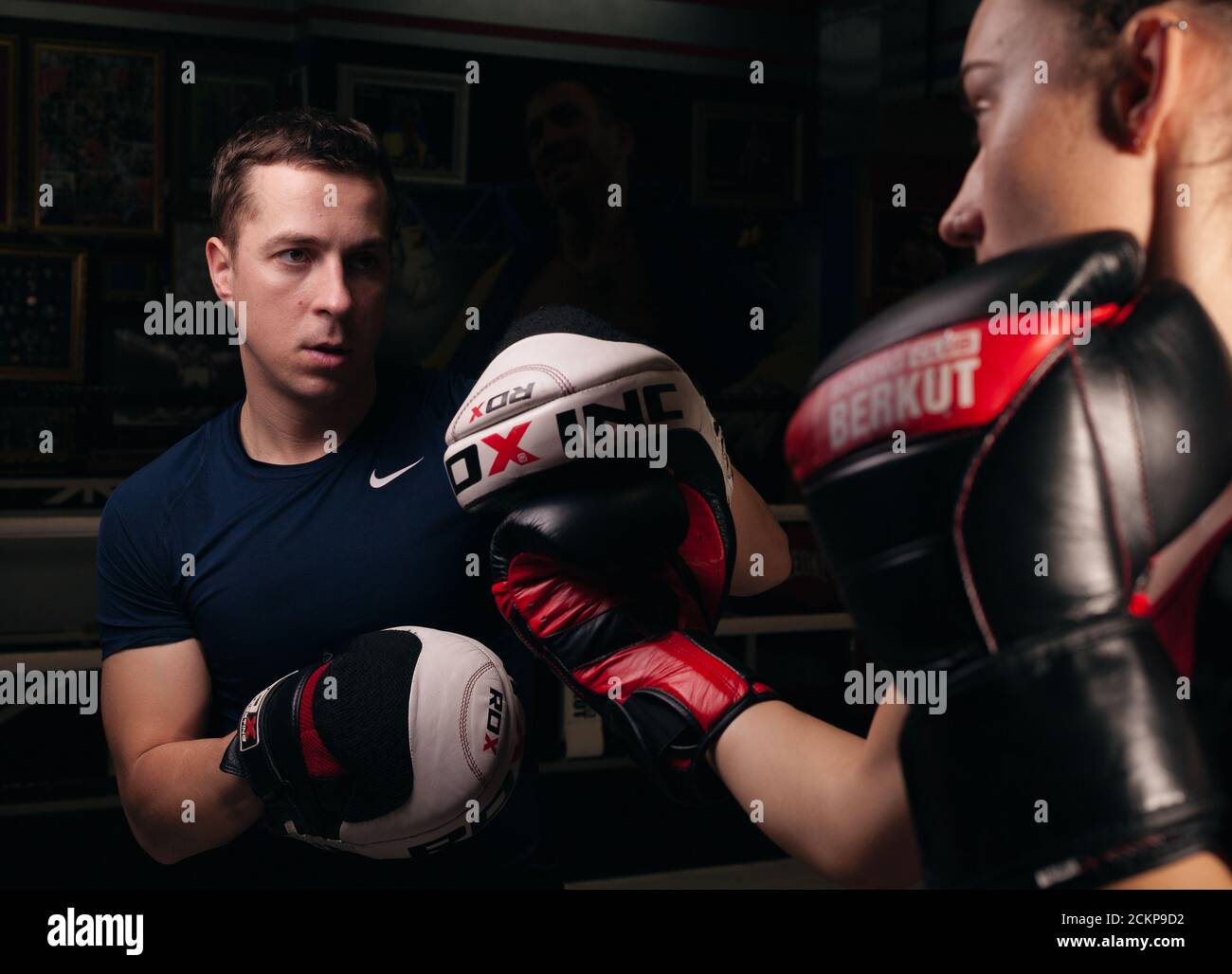 Boxing paws hi-res stock photography and images - Alamy