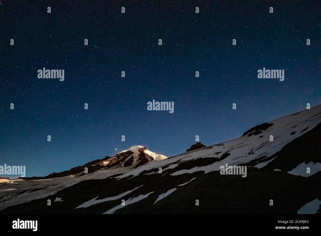 Mount Baker at night, lit up by the moon, with stars all around, Mount ...