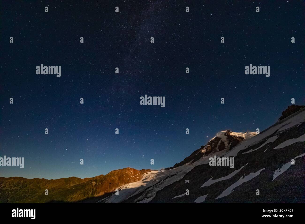 Mount Baker at night, lit up by the moon, with stars all around, Mount ...