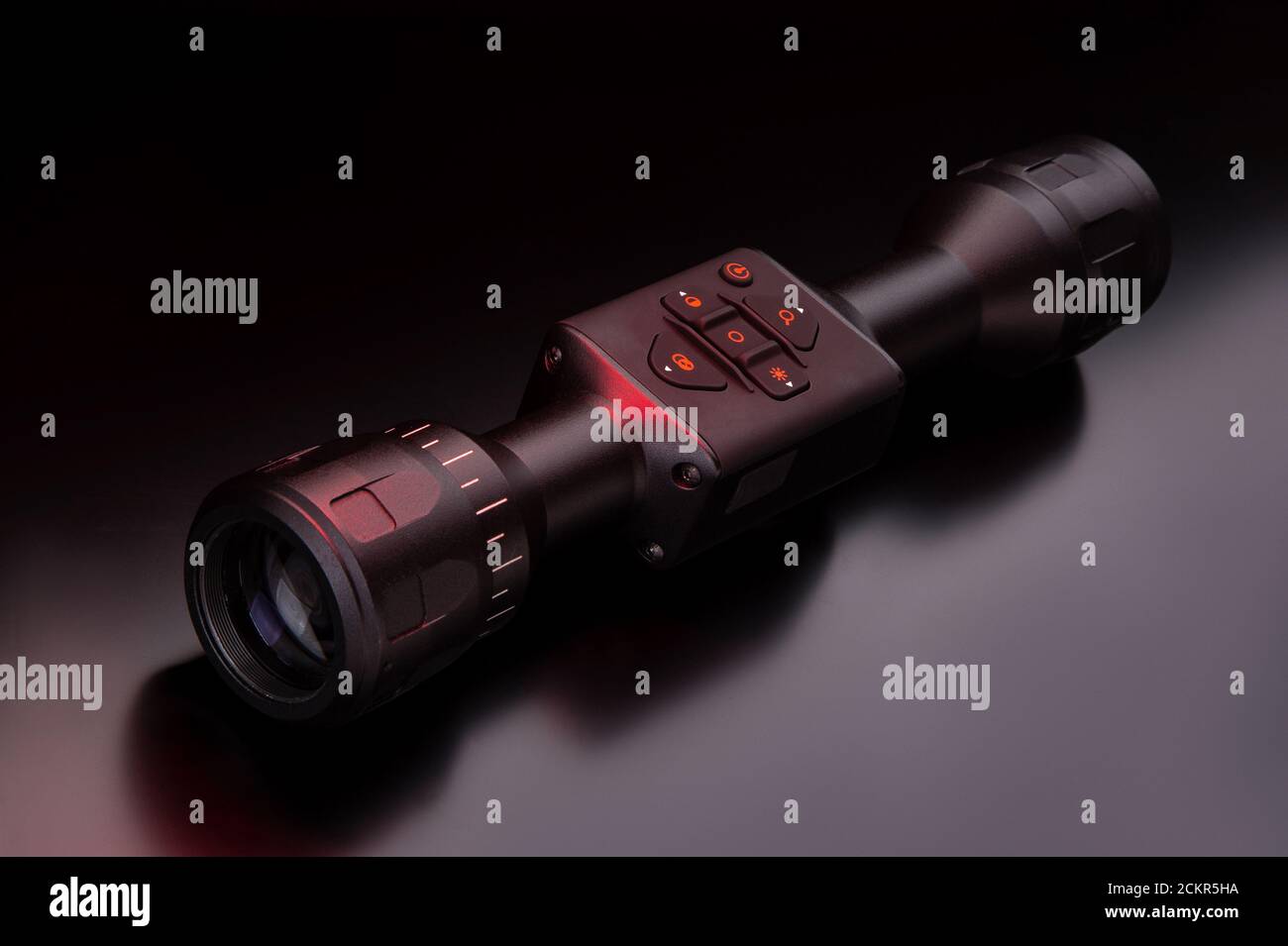 Modern sniper scope on a dark background. Optical device for aiming and ...
