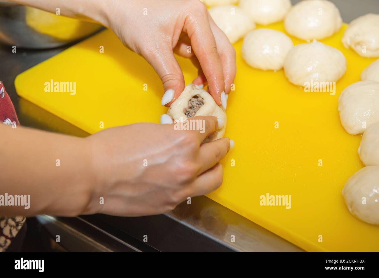 cook's hands make pies. Cooking pies in restaurants and at home Stock ...