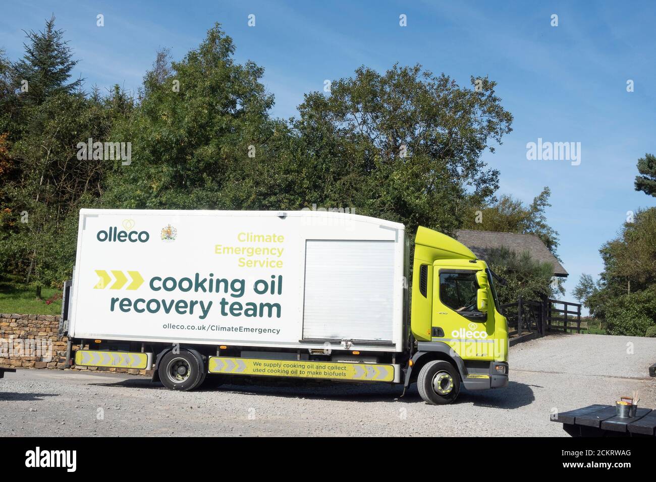 Olleco lorry collecting used cooking oil from a hilltop café in the ...