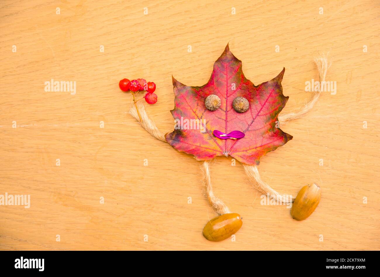dancing red maple leaf concept Stock Photo - Alamy