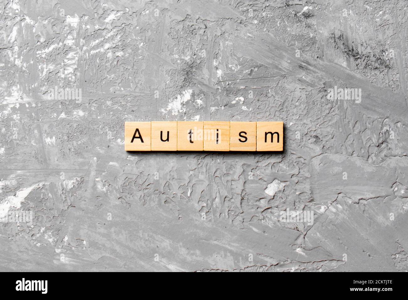 autism word written on wood block. autism text on table, concept Stock ...