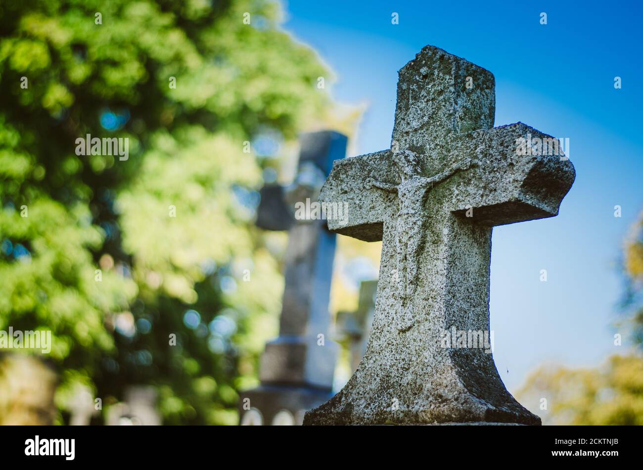 religious stone, symbol of cristianity in the graveyard Stock Photo - Alamy