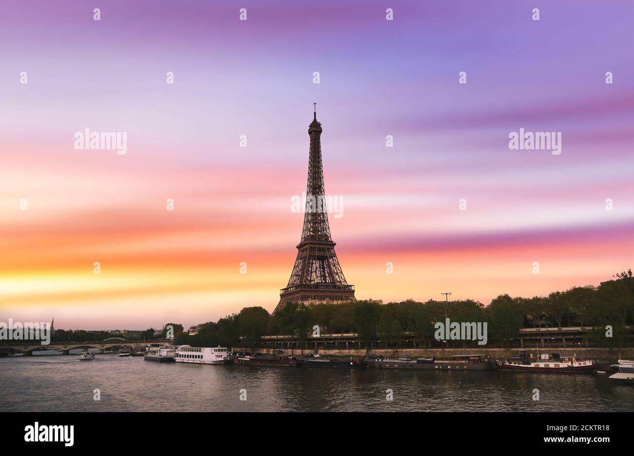 Sunset over the the Eiffel Tower and the Seine River in Paris, France ...