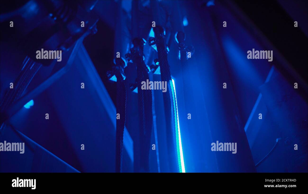 Lifts in modern interior in blue. Glass elevator Stock Photo - Alamy
