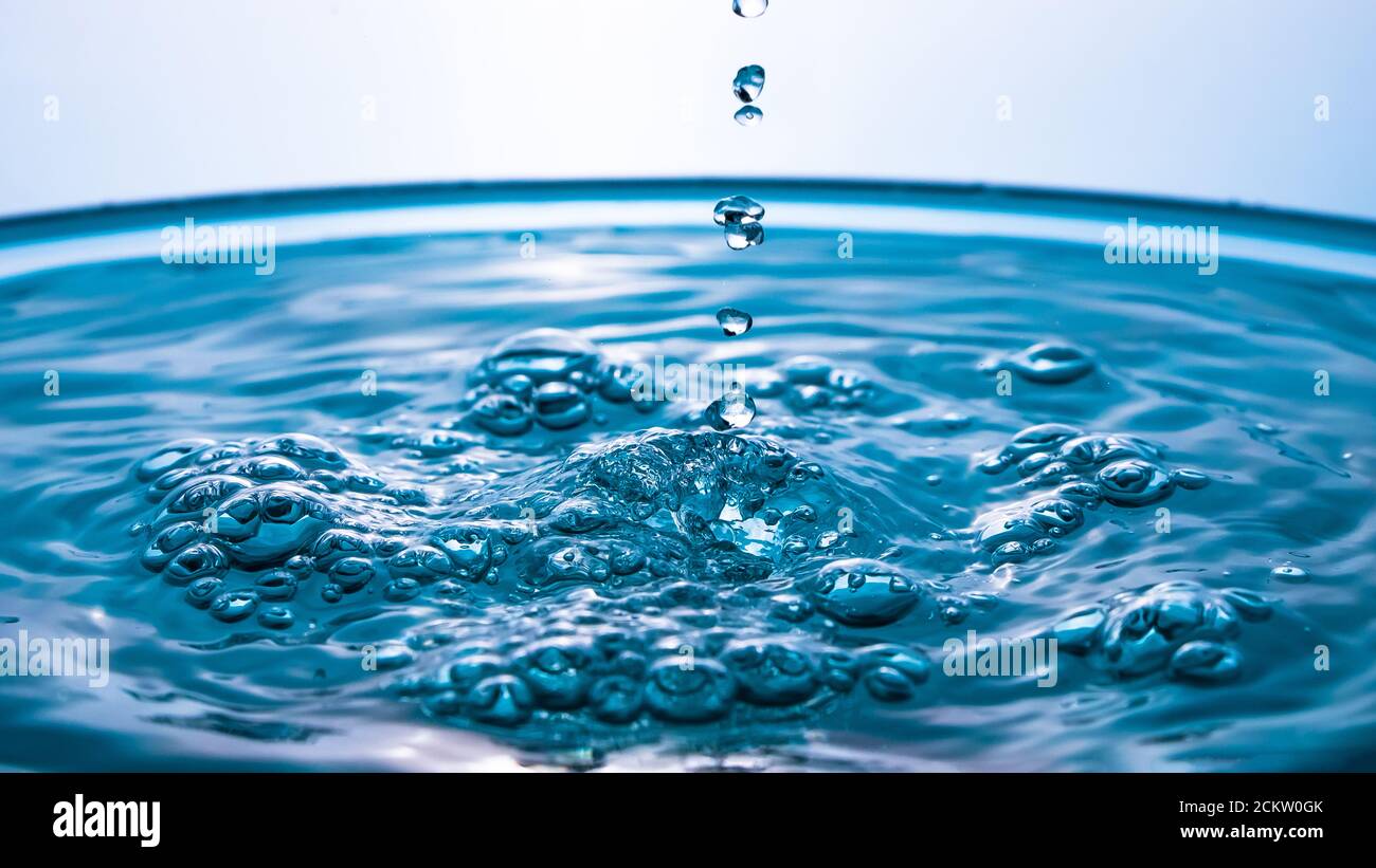 Abstract an outbreak of water. Splash of water close-up. Frozen water ...