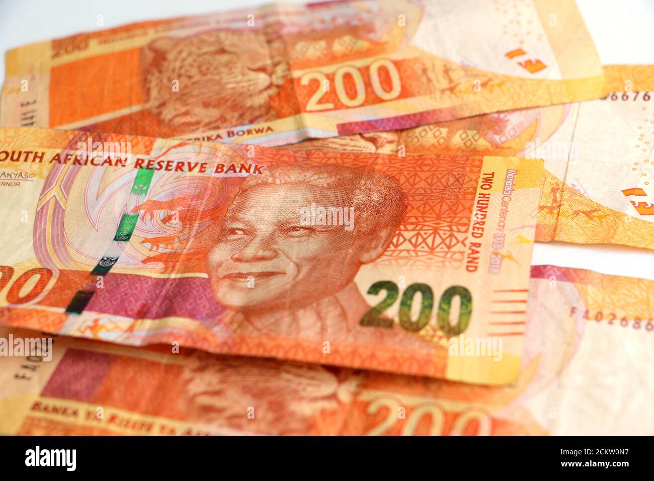 An isolated pile of two hundred rand notes currency from South Africa ...