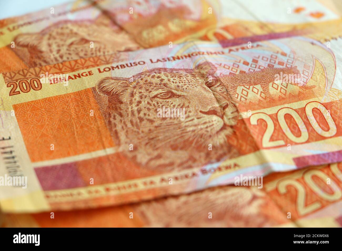 An isolated pile of two hundred rand notes currency from South Africa ...