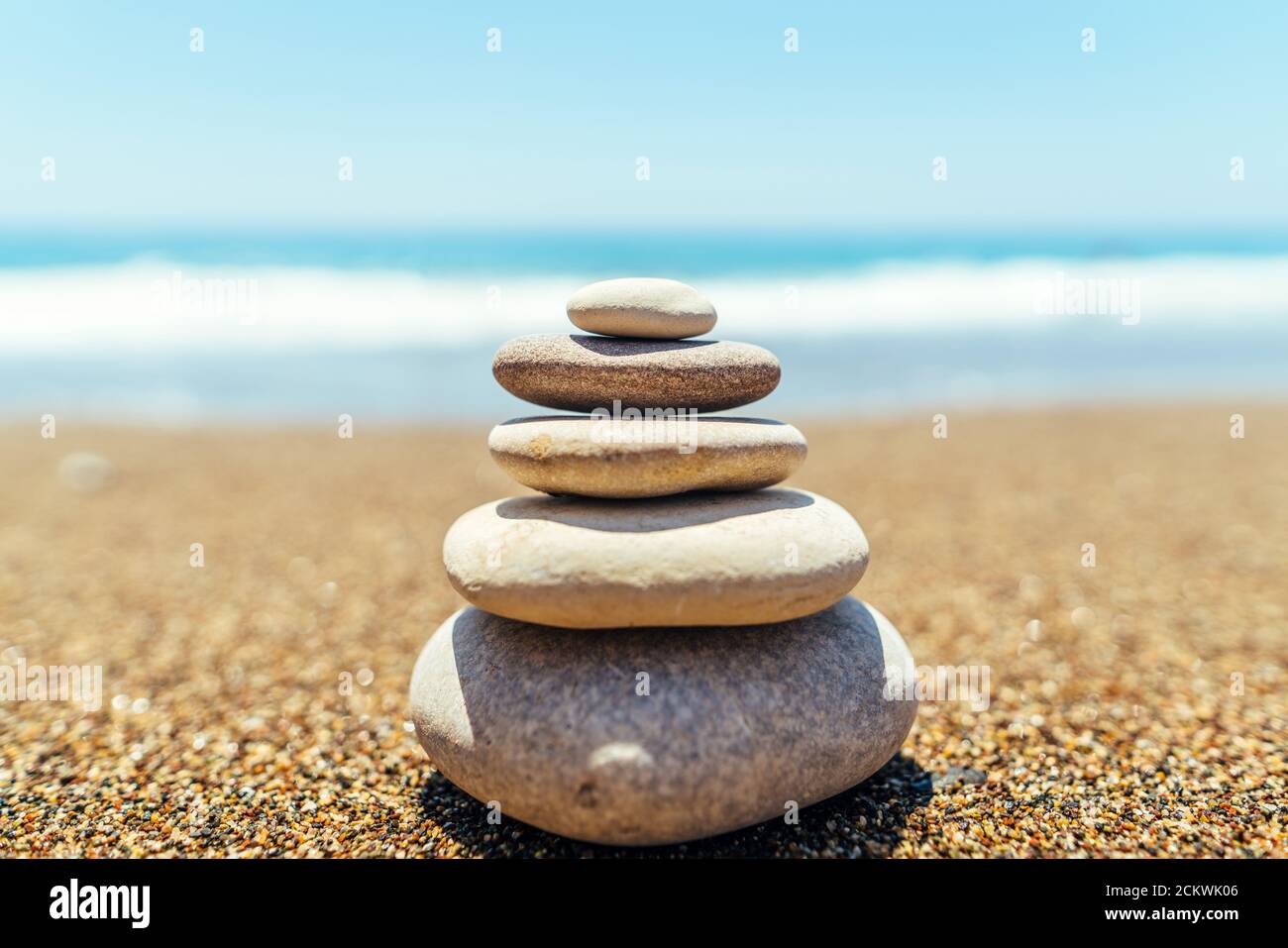 Stack of zen stones on the beach Stock Photo - Alamy