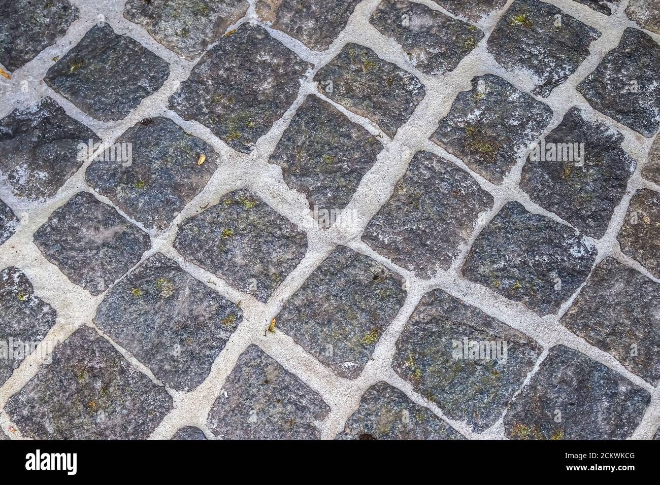 Detailed close up on old historical cobblestone roads and walkways all ...