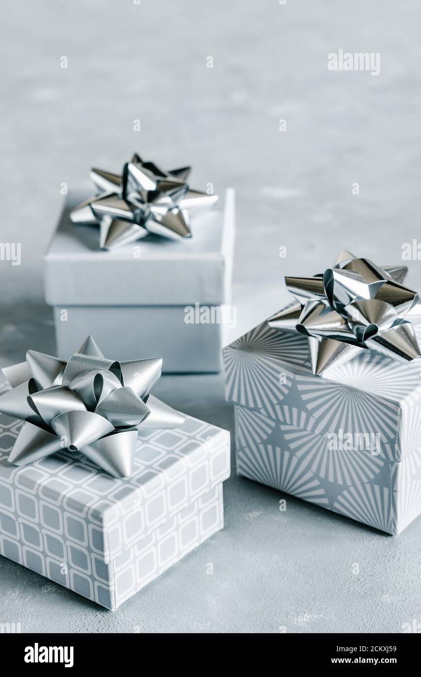 Many silver gift boxes hi-res stock photography and images - Alamy