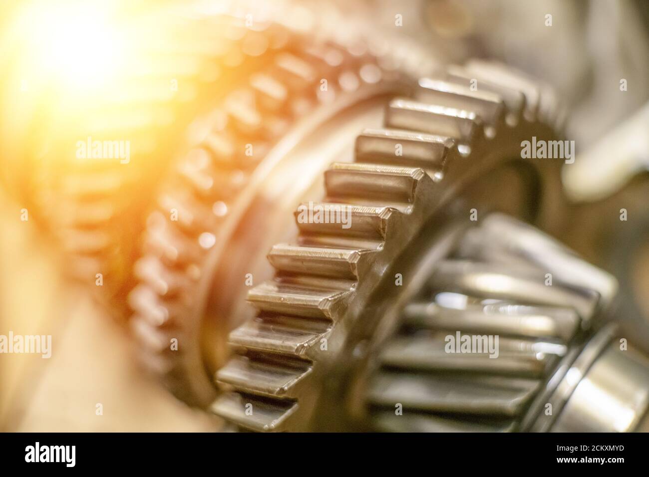 The gears from the car's gearbox close up. Photo with illumination ...
