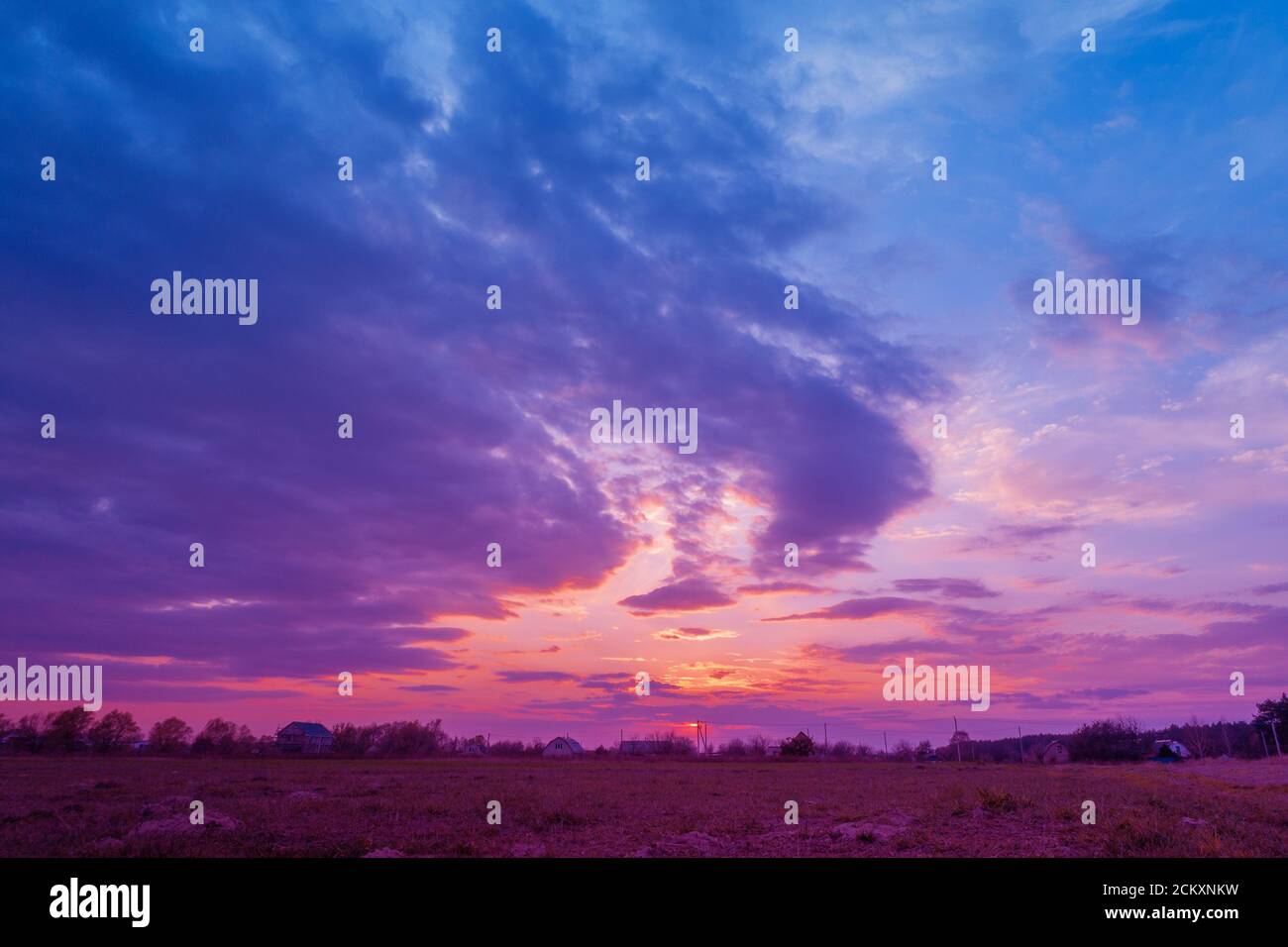 Colorful cloudy sky at sunset. Sunset over the countryside. Sky texture ...