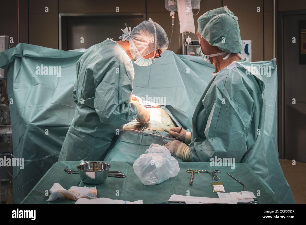 an abdominal operation is performed in an operating room Stock Photo ...