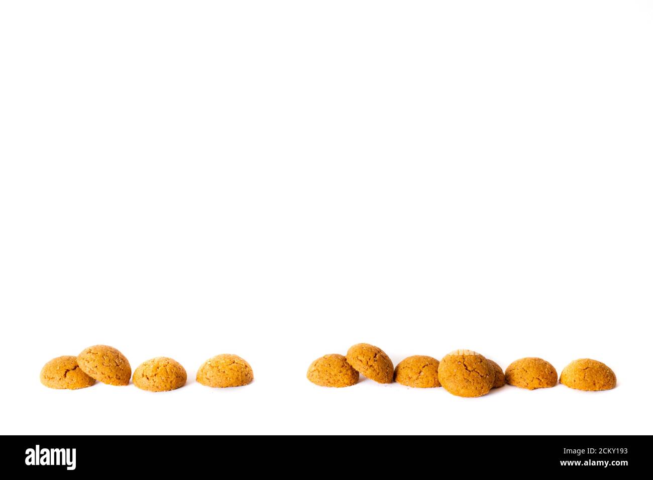 Side view of traditional Dutch Candy called 'Pepernoten' on white ...