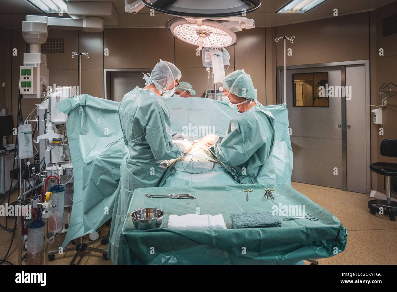 an abdominal operation is performed in an operating room Stock Photo ...